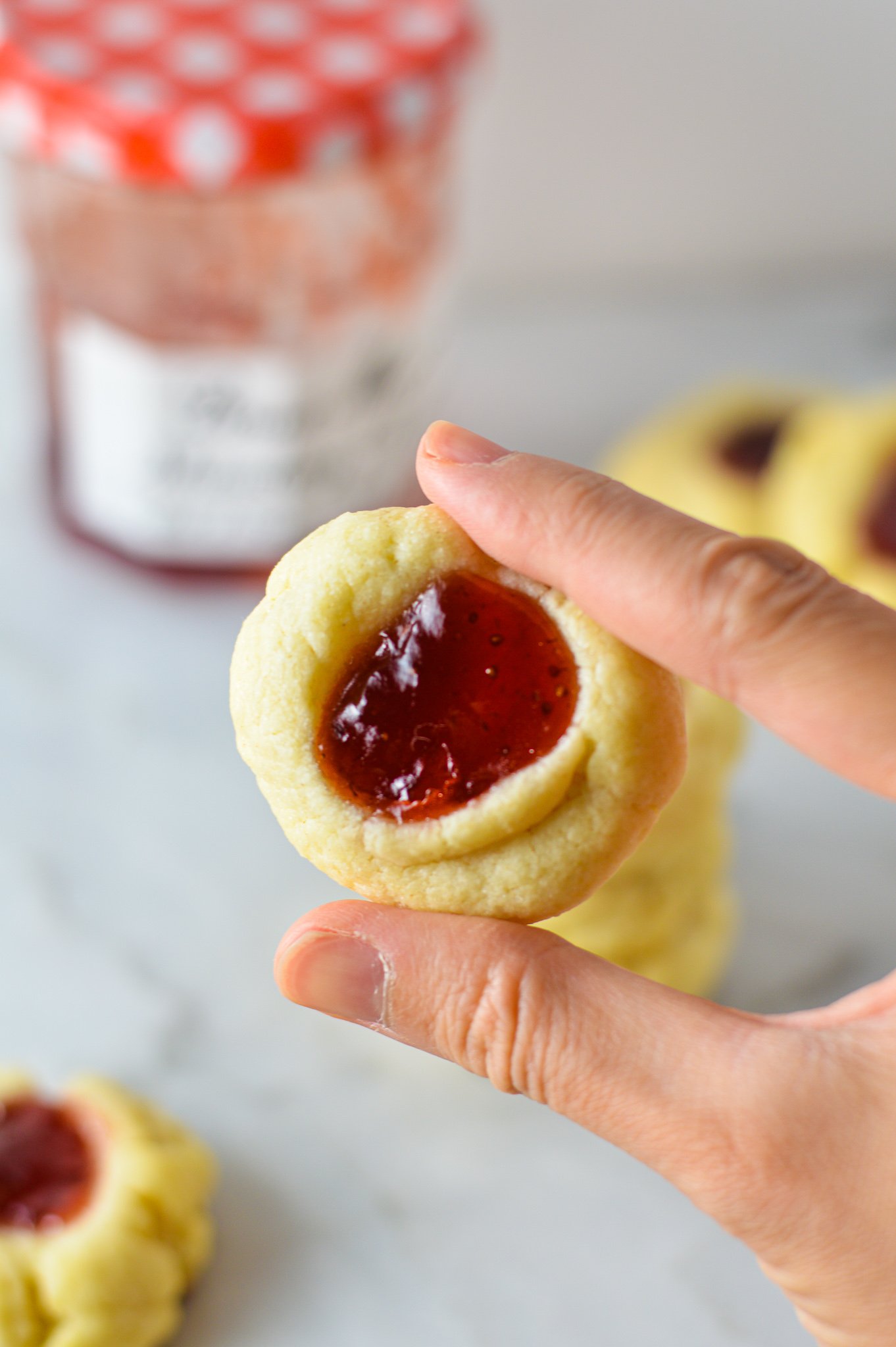 Raspberry Cream Cheese Thumbprint Cookies | A Taste of Madness
